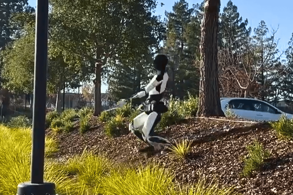 Tesla’s Optimus Bot shows it stumbling and handling difficult terrain ...